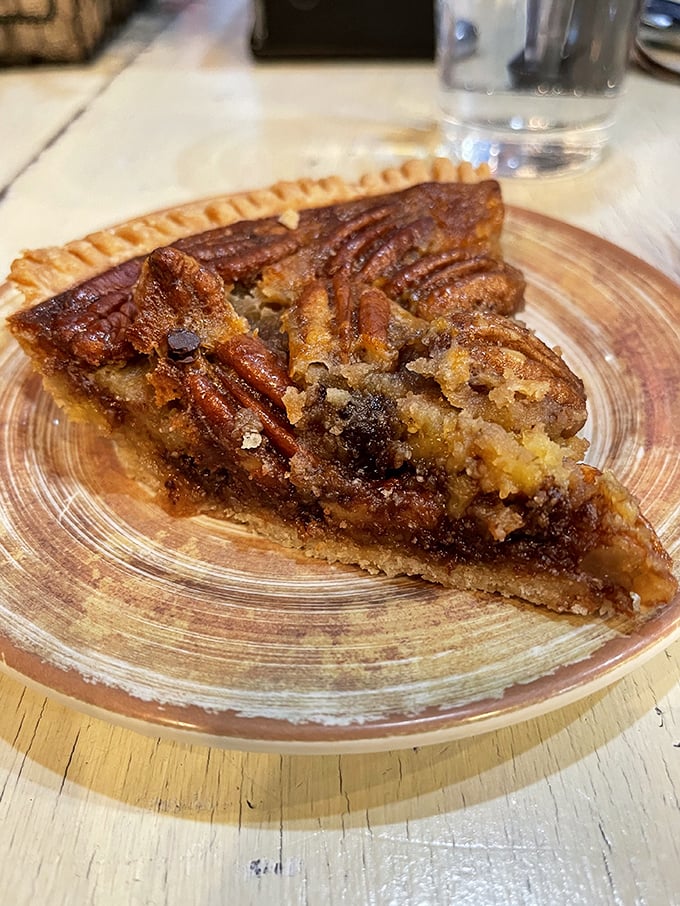 That glistening pecan filling showcases nature's candy in its ideal habitat—surrounded by buttery, flaky crust.