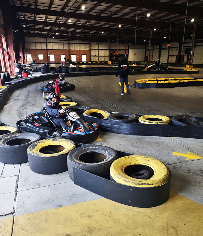 The racetrack stretches out like an asphalt promise of glory, with enough turns to humble anyone who thought driving a minivan qualified as "experience."