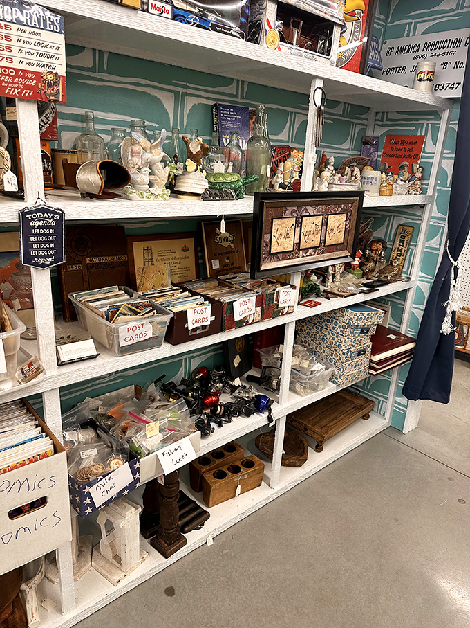 Remember when postcards were how we said "wish you were here"? This booth celebrates those pre-Instagram days with bins of memories and shelves of charming figurines.
