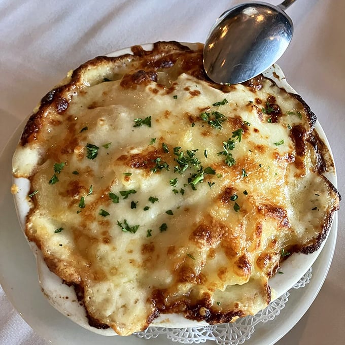 Bubbling cheese, golden crust&mdash;this potatoes au gratin isn't just a side dish, it's what comfort looks like after taking a hot bath in cream.