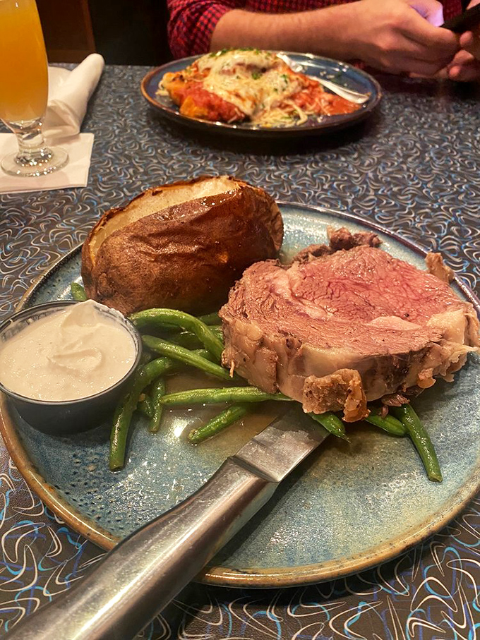 Prime rib cooked to that perfect shade of pink that makes carnivores go weak in the knees. Green beans for color, potato for comfort.