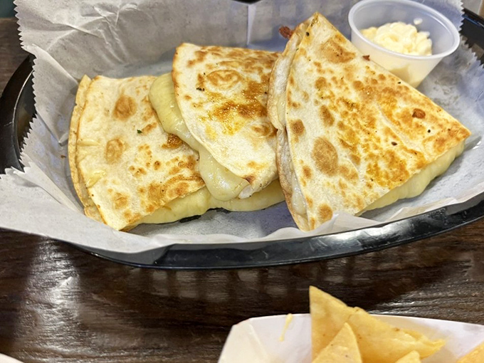 Golden-brown quesadillas with that perfect cheese pull&mdash;the kind that makes strangers at nearby tables suddenly become your best friends.