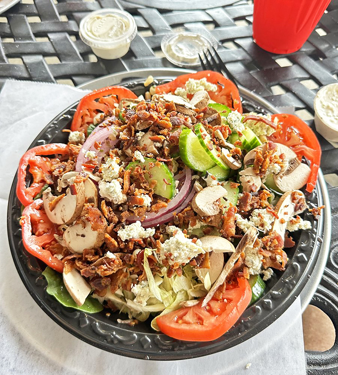 For those who claim they're "just having a salad today," this beauty offers both virtue and vice with its bacon and blue cheese confetti.