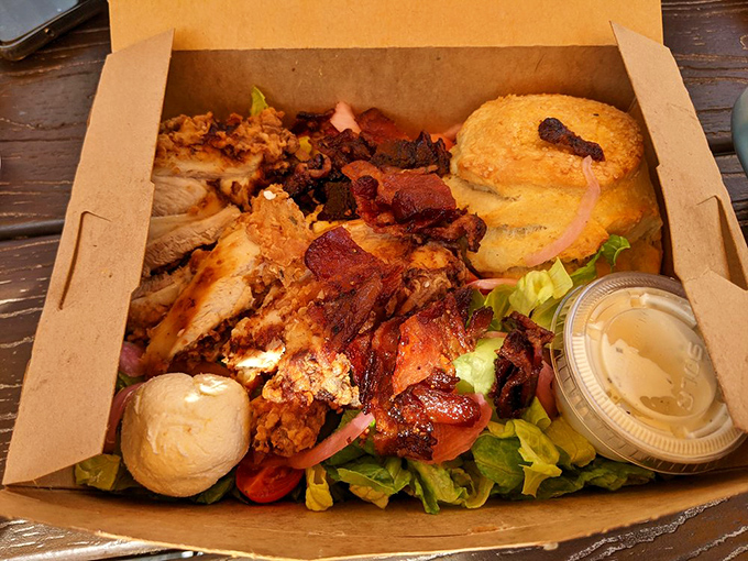 When takeout looks this good, you understand why the locals are willing to wait. That biscuit alone is worth setting your alarm for.