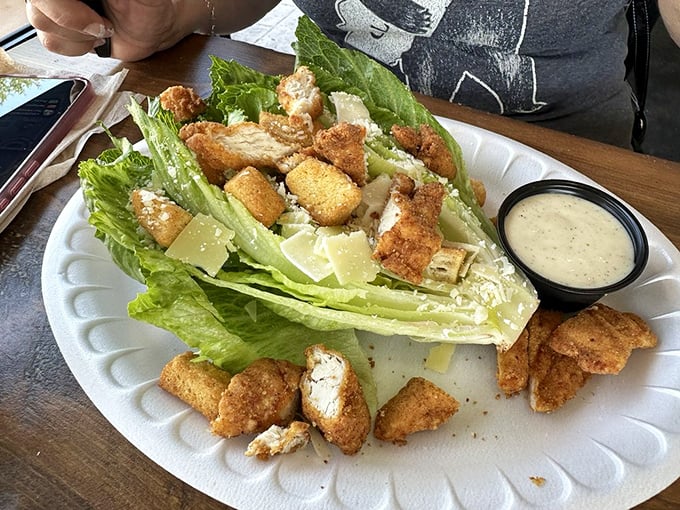 A Caesar salad that actually deserves its imperial name, with crisp romaine playing throne to perfectly seasoned fish.