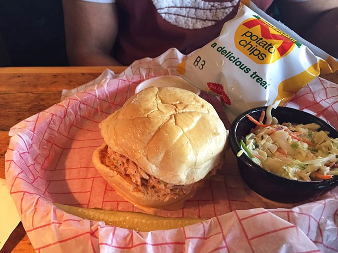 The pulled pork sandwich &ndash; a humble masterpiece on a soft bun with coleslaw that provides the perfect cool counterpoint to smoky warmth