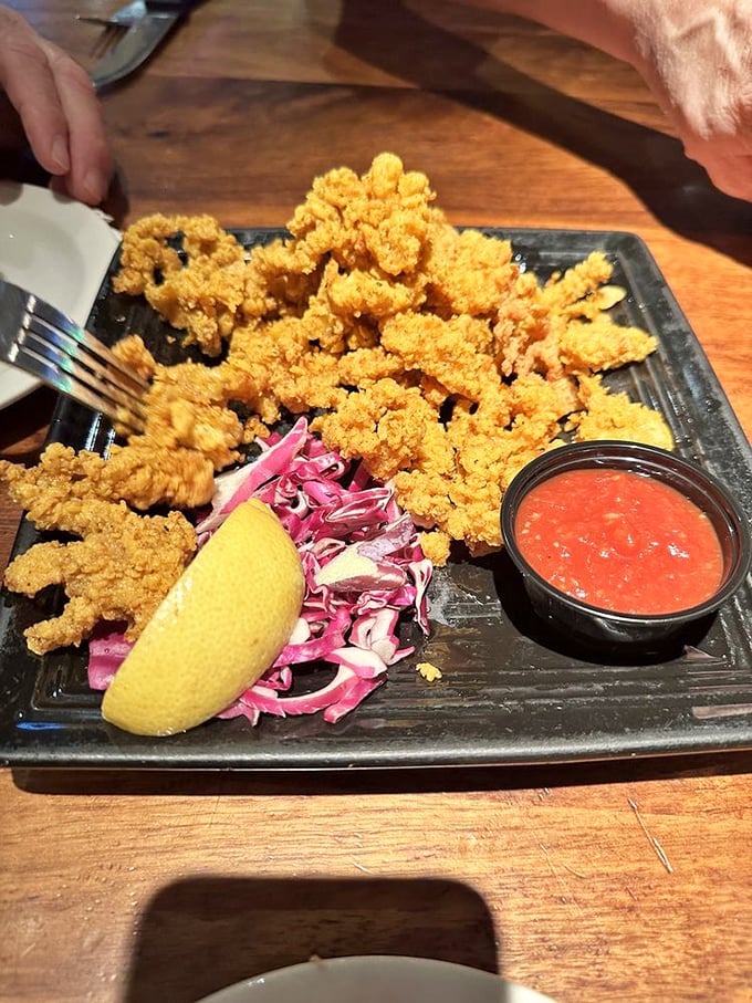 Same clams, different angle&mdash;like seeing your favorite movie star from their good side. That dipping sauce deserves its own fan club.