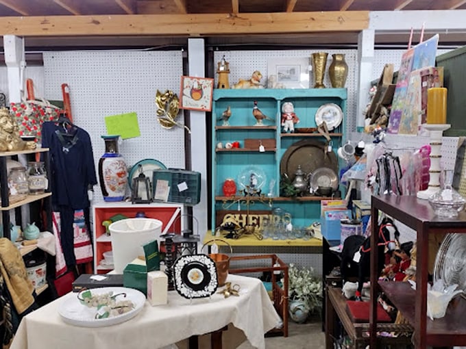 This turquoise cabinet steals the show among a sea of collectibles. One person's castoff becomes another's conversation piece. 