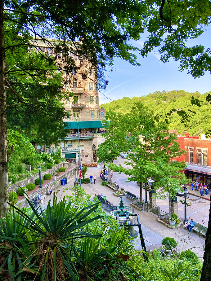 Basin Park serves as Eureka Springs' living room, where lush greenery frames the historic Basin Park Hotel and invites visitors to pause and people-watch.
