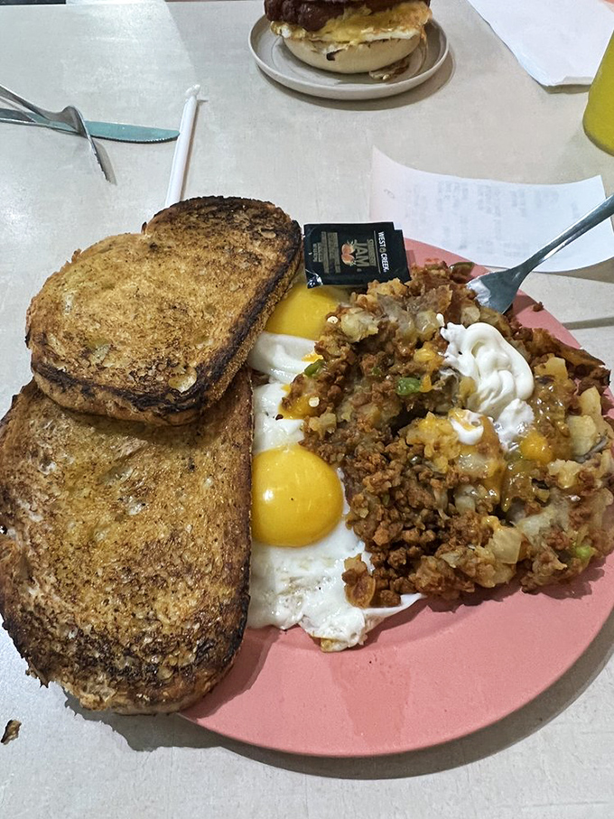 The breakfast plate that launched a thousand food dreams&mdash;crispy-edged hotcakes with eggs and home fries that redefine morning expectations.