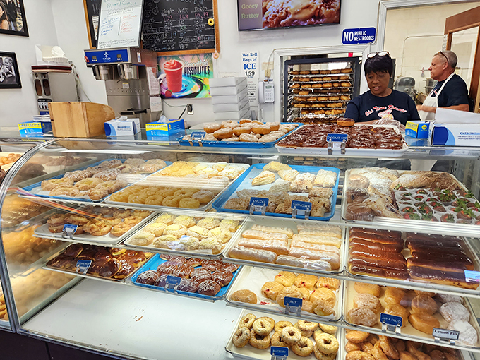 Where donut magic happens. The display case is like a museum of edible art, only you're encouraged to take pieces home.