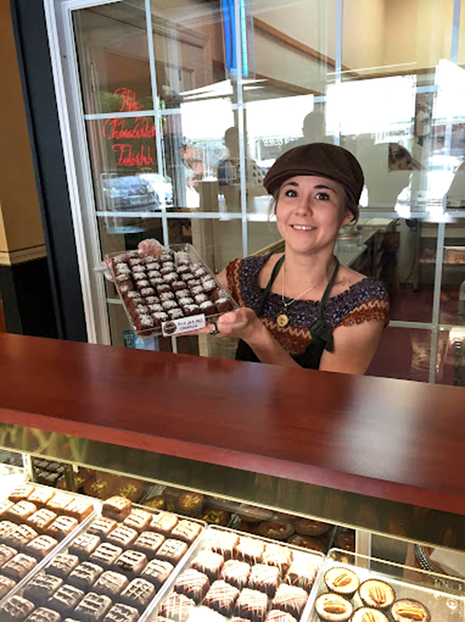 Behind every great chocolate is a passionate chocolatier. That smile says, "I know something delicious that you don't... yet."
