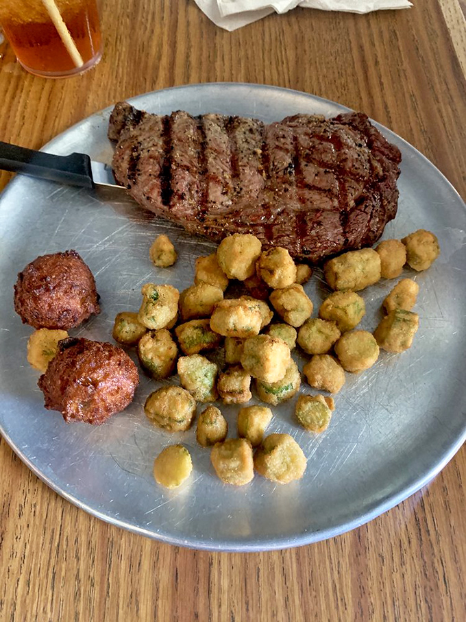 Surf meets turf in perfect harmony &ndash; a perfectly grilled steak with crispy hushpuppies proves this place understands more than just seafood.
