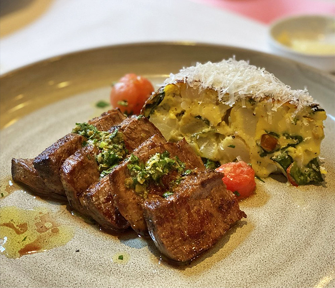 The steak sits proudly alongside potato cake like an old Hollywood power couple&mdash;classic, commanding, and causing everyone to stare.
