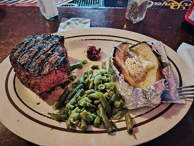 A steak so perfectly cooked it should have its own Instagram account. Those green beans aren't just a side &ndash; they're witnesses to greatness.