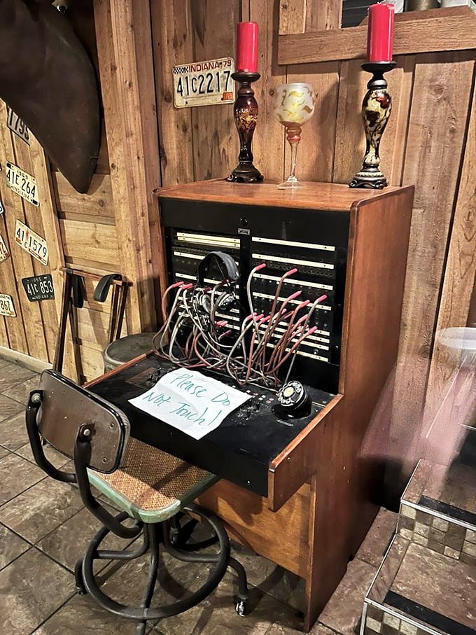 "Please Do Not Touch!" warns the vintage switchboard display&mdash;a charming nod to history amid your thoroughly modern meat feast.