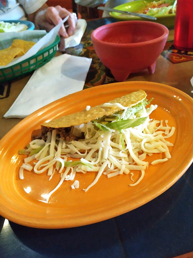 This taco isn't playing hard to get&mdash;it's flaunting its cheese, fresh veggies, and crispy shell like it knows exactly what you want.