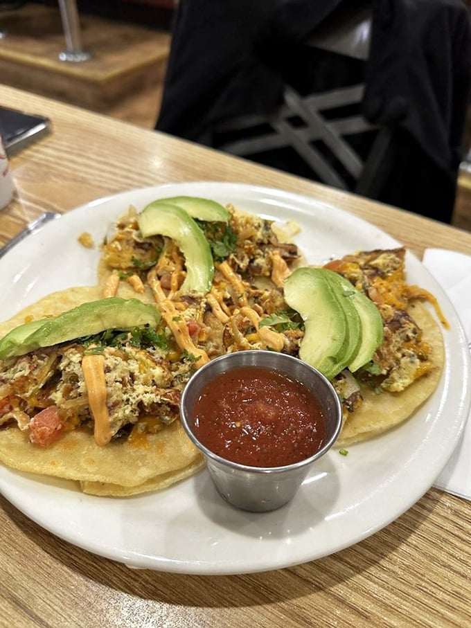 Breakfast tacos that make you question why we don't start every day this way. Fresh avocado and house-made salsa elevate this morning masterpiece.