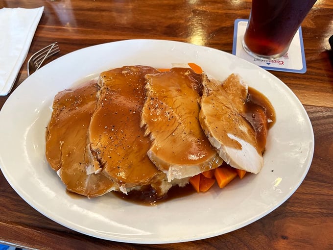 Turkey dinner that grandma would approve of, swimming in gravy that should have its own fan club and retirement plan.