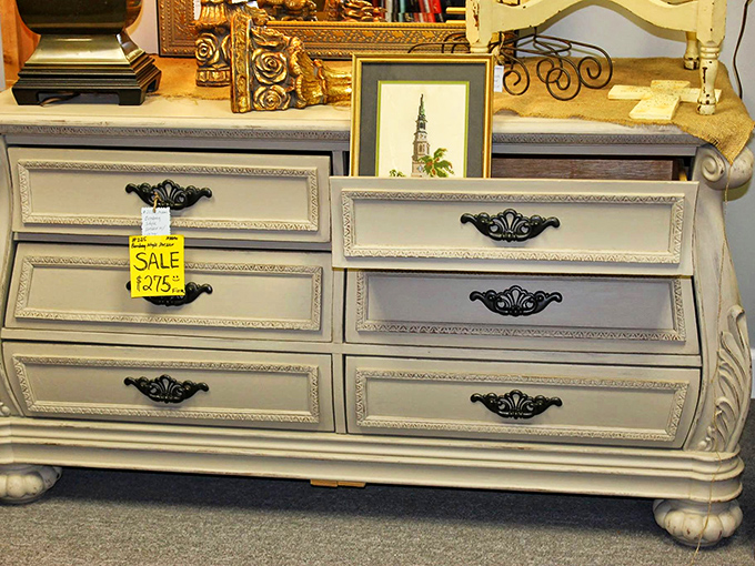 This elegant dresser is waiting for its second act in someone's home. Shabby chic before it was a Pinterest category.