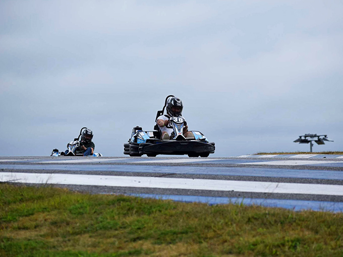 Racing's universal language: leaning into turns while trying to outpace your friends. Some conversations are best had at 50 mph.