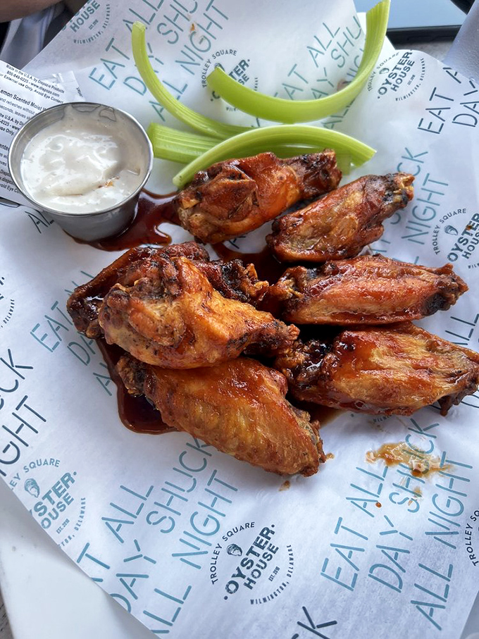Wings that look like they've been blessed by the hot sauce gods, served with cooling celery sticks&mdash;nature's edible napkins.