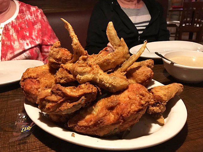 A platter that could make angels weep &ndash; where wings and dark meat mingle in crispy harmony that puts ordinary fried chicken to shame.
