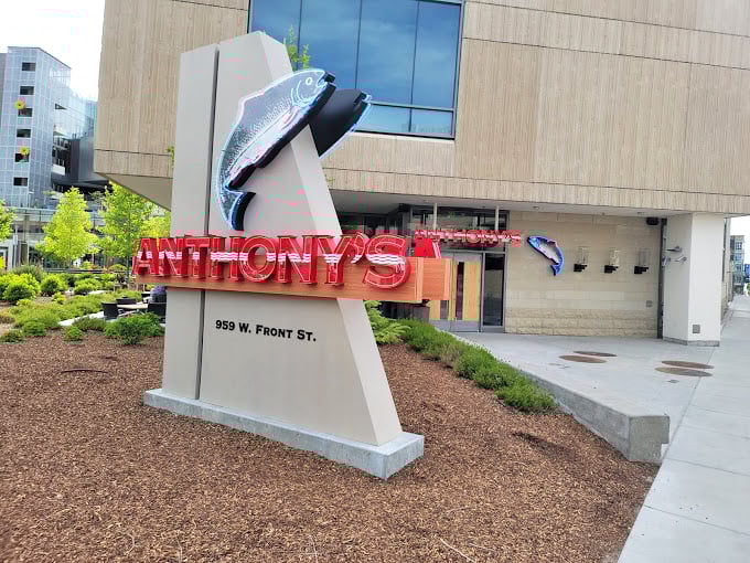 Anthony's modern fish sculpture announces its seafood mission with architectural flair—subtlety is for lesser restaurants.
