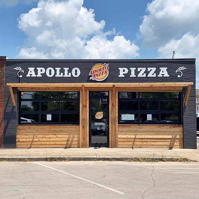 Apollo Pizza: Sleek black exterior with wooden warmth &ndash; the James Bond of pizza joints. Sophisticated yet approachable, like a tuxedo with sneakers.