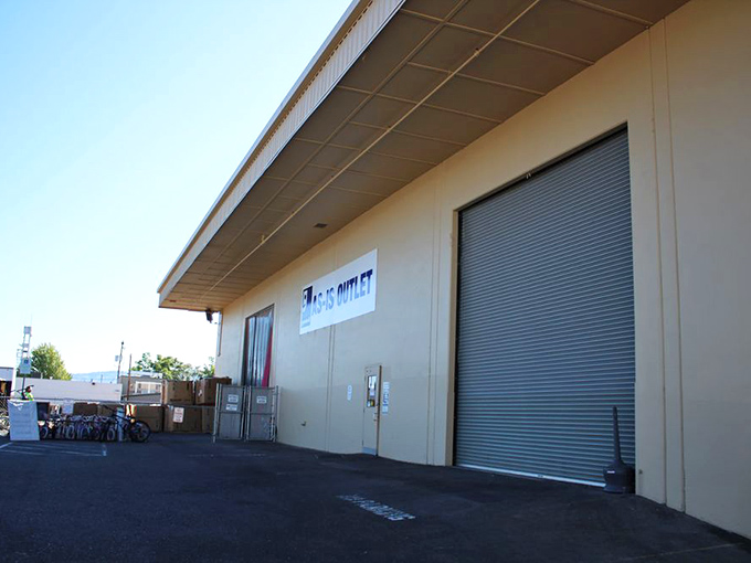 Goodwill's warehouse exterior hides the ultimate treasure hunting grounds where patience is rewarded with spectacular finds.