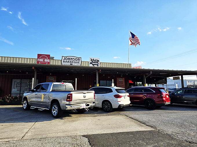 Johnson's no-nonsense exterior and proudly flying flag tell you this is serious BBQ territory&mdash;no frills, just thrills for your taste buds.