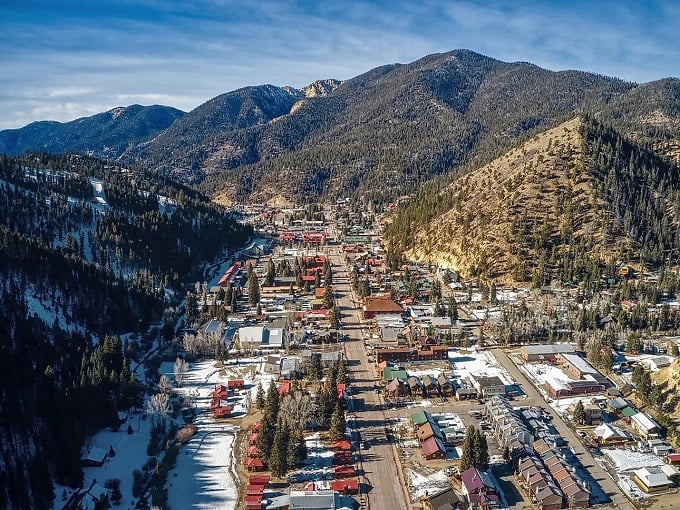 Red River's main street could be the poster child for "charming mountain town" &ndash; complete with rustic storefronts and pine-covered peaks.