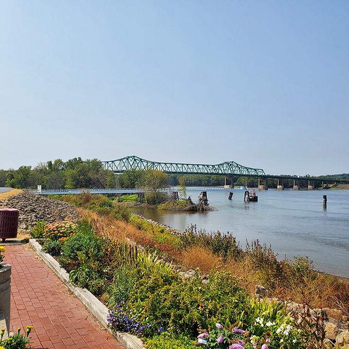 The mighty Mississippi flows past Fulton's shores, carrying barges, boats, and the occasional fish tale.
