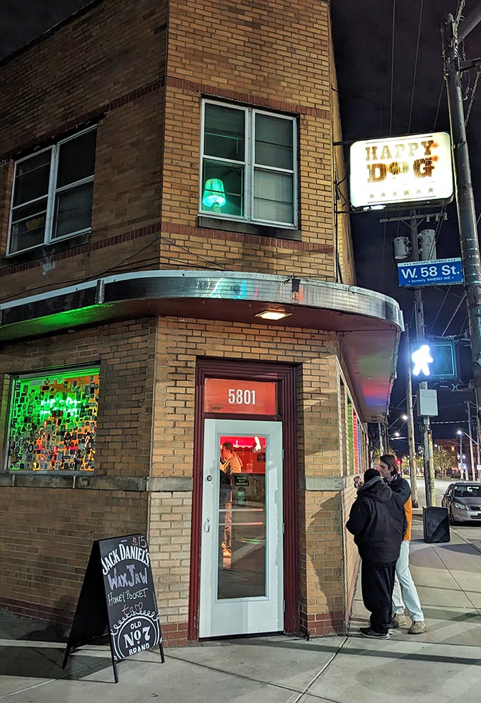 By night, this neon sign transforms into a bat signal for those seeking hot dog salvation after dark.