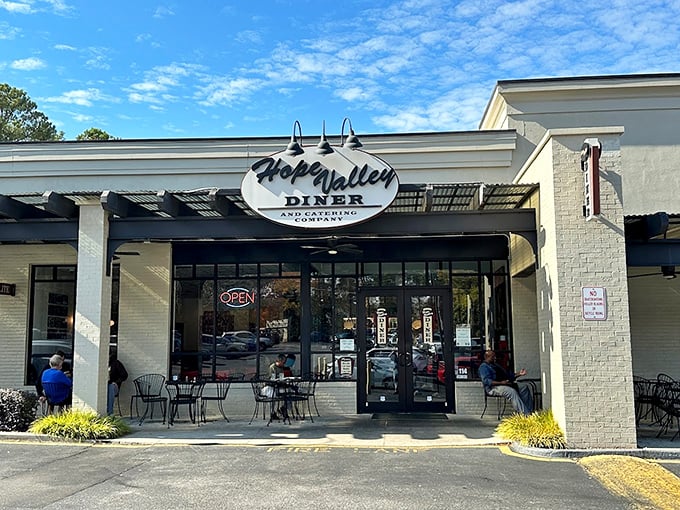 Hope Valley Diner entrance with outdoor seating: Where modern meets timeless&mdash;a place that understands both perfect hash browns and gluten-free options aren't mutually exclusive.