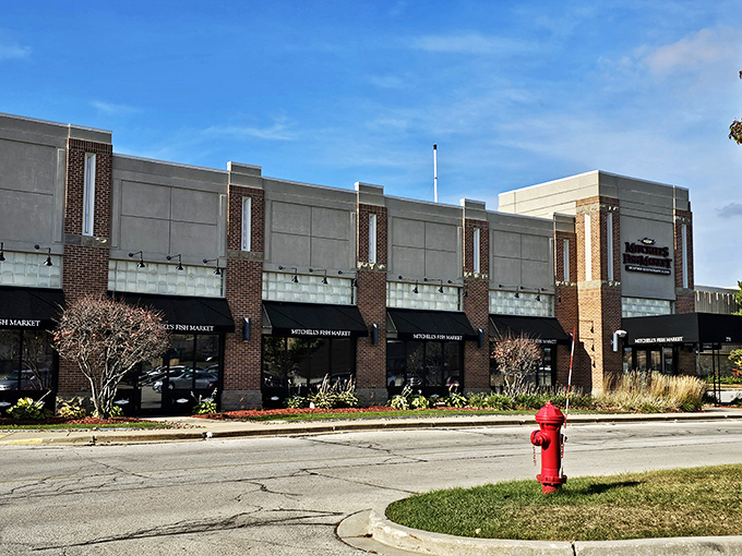 Mitchell's exterior view: A seafood oasis in suburbia, complete with tasteful landscaping. That red fire hydrant is practically standing guard over fish treasures inside.