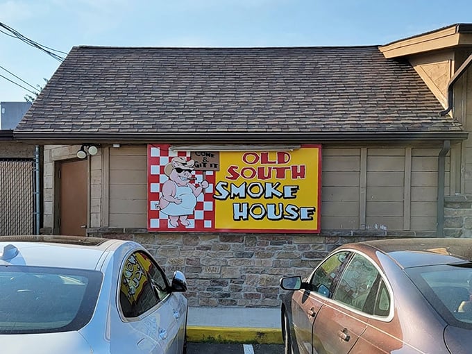 Old South Smoke House: The checkered pig sign isn't just cute &ndash; it's a promise of smoky delights that'll haunt your dreams.