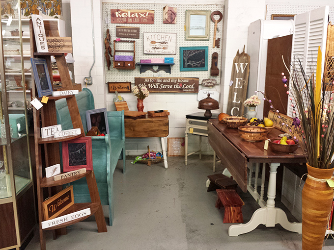 Staged vignettes show how vintage finds can transform your home. That ladder shelf is speaking to my wallet!