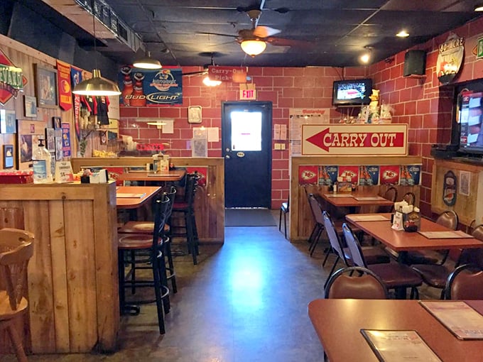 Inside R.J.'s, the warm wood paneling and red brick create the perfect backdrop for meat-induced happiness.