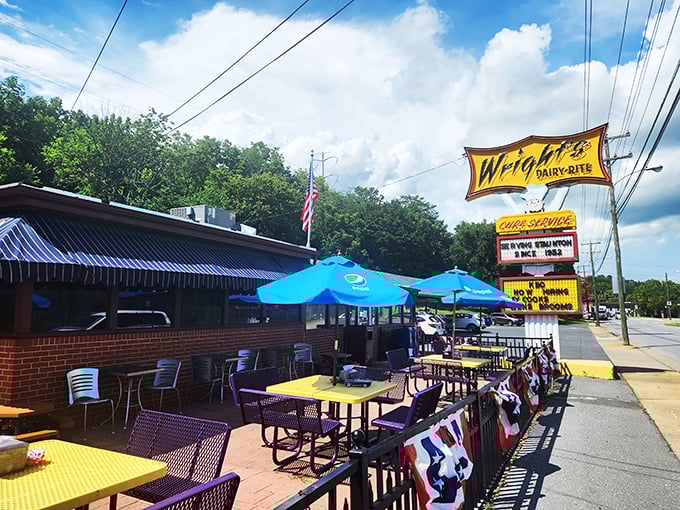Those outdoor tables aren't just seating &ndash; they're front-row tickets to America's longest-running love affair with drive-in dining.