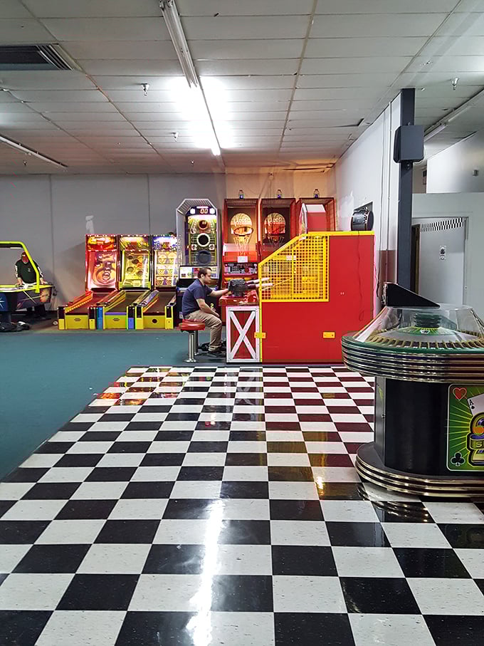 Between races, the arcade offers alternative competitions where thumbs, not pedal feet, become the heroes of digital battlegrounds.