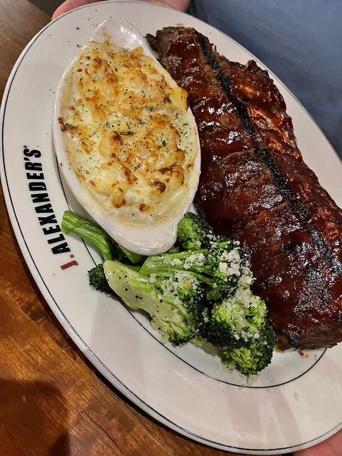 These ribs don't just fall off the bone&mdash;they practically leap onto your fork. The mac and cheese sidekick deserves its own fan club.