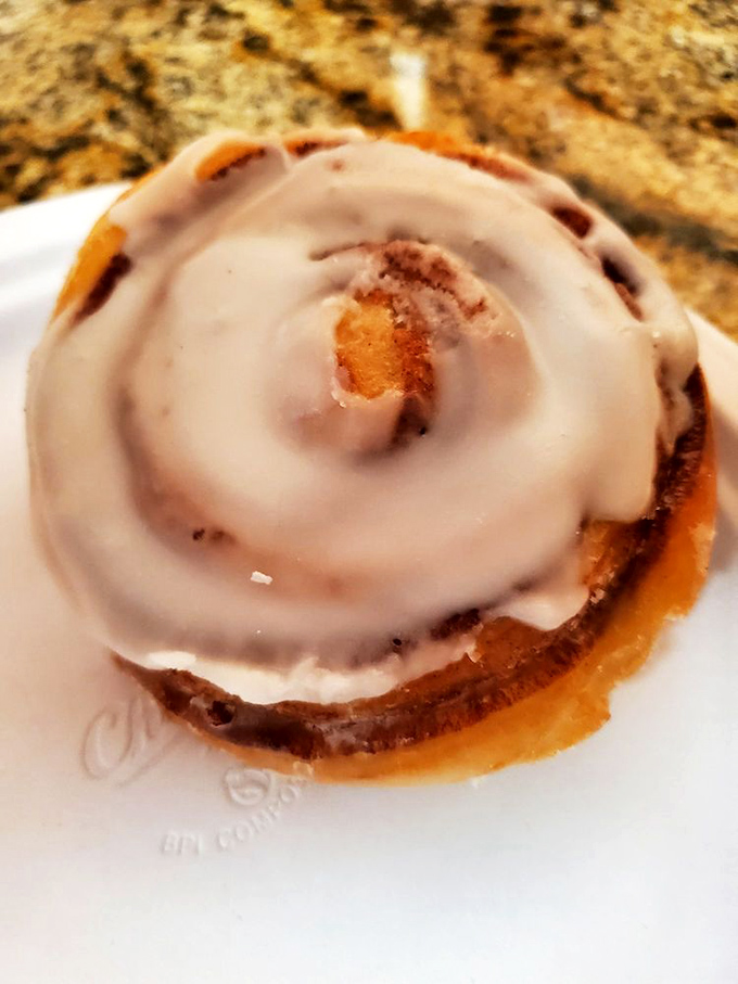 The cinnamon roll spiral practically hypnotizes you into taking "just one more bite" until—mysteriously—only crumbs remain.