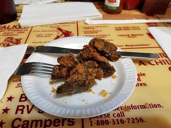 These crispy morsels might look humble, but they pack a flavor punch that's converted even the most skeptical liver-doubters for generations.