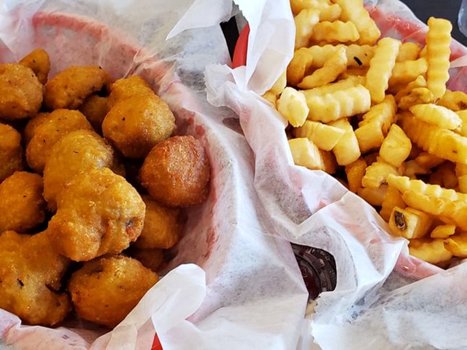 These golden-fried mushroom caps and crinkle-cut fries aren't just sides &ndash; they're supporting actors deserving of their own standing ovation.
