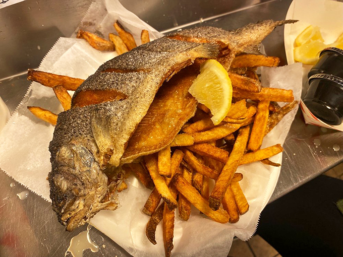 The whole trout, crisp-skinned and tender-fleshed, proves that sometimes the best seafood experiences come in full-bodied packages.