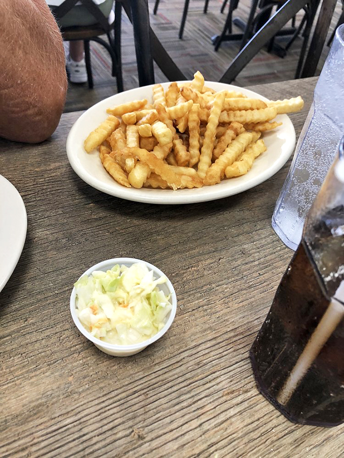 Crinkle-cut fries that achieve the perfect balance of crispy exterior and fluffy interior&mdash;the Goldilocks of side dishes, served with a side of nostalgia.