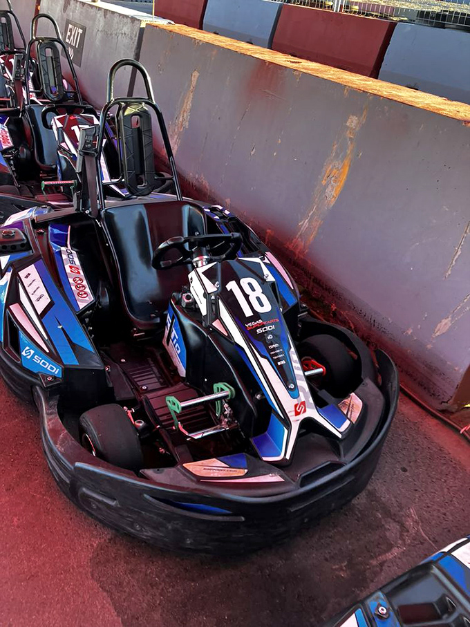 Kart #18 waits patiently for its next driver. It's seen beginners, it's seen pros, and it's seen everything in between.