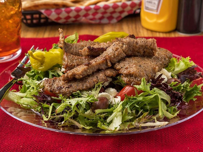 Garden-fresh greens supporting heroic portions of seasoned meat. Salads this good make you forget you're being virtuous.