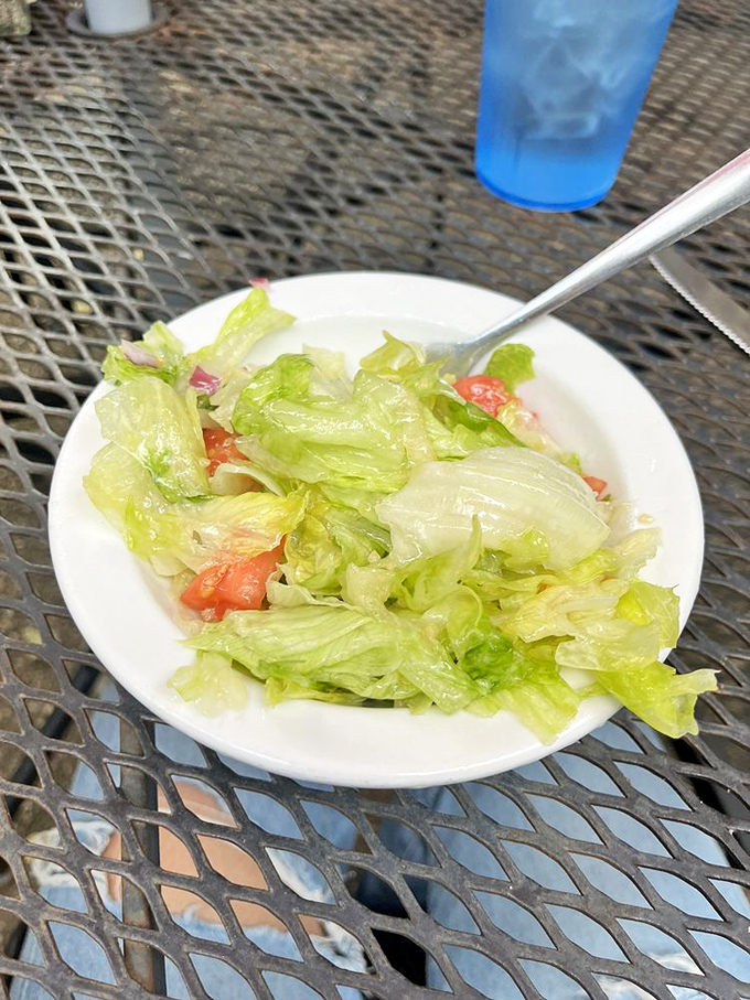 Even the salad knows its role&mdash;a crisp, refreshing interlude that cleanses the palate without stealing the spotlight from the main event.